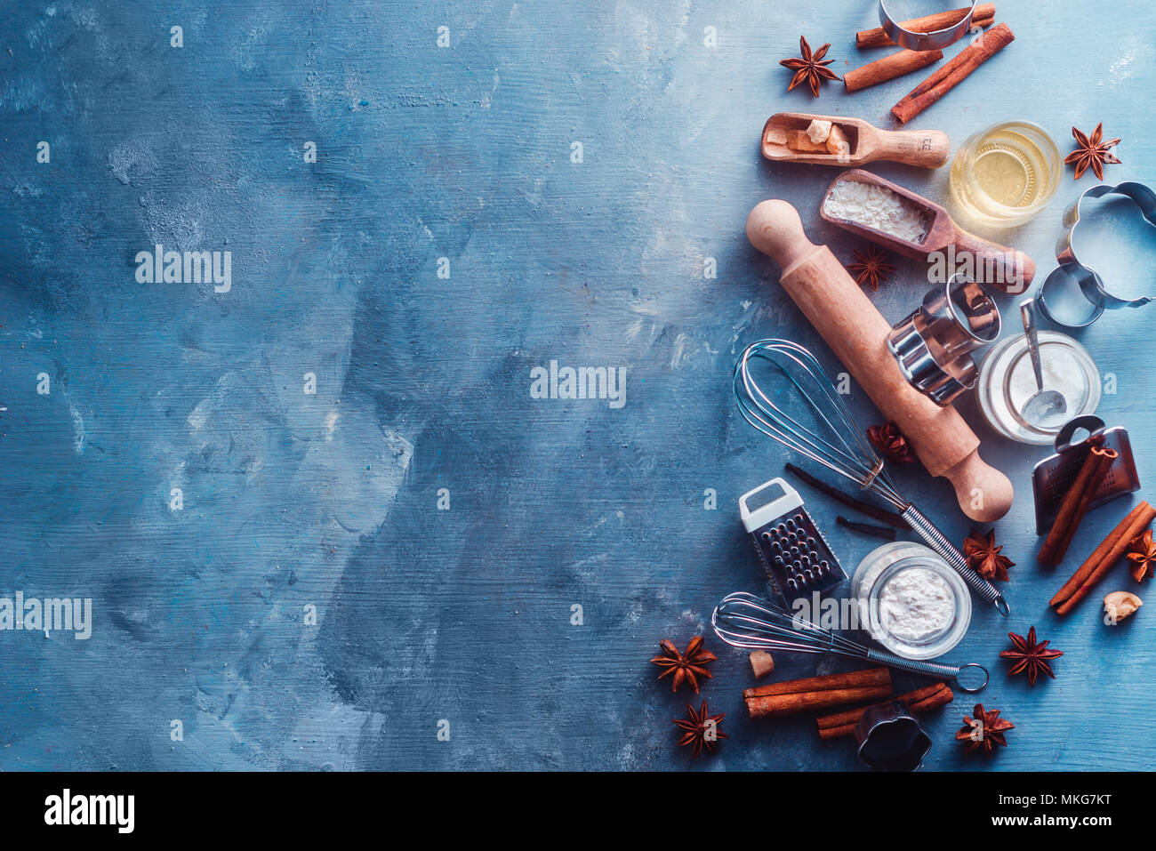 Baking utensils header. Spoons, sea salt, eggs, flour, oil and sugar ...