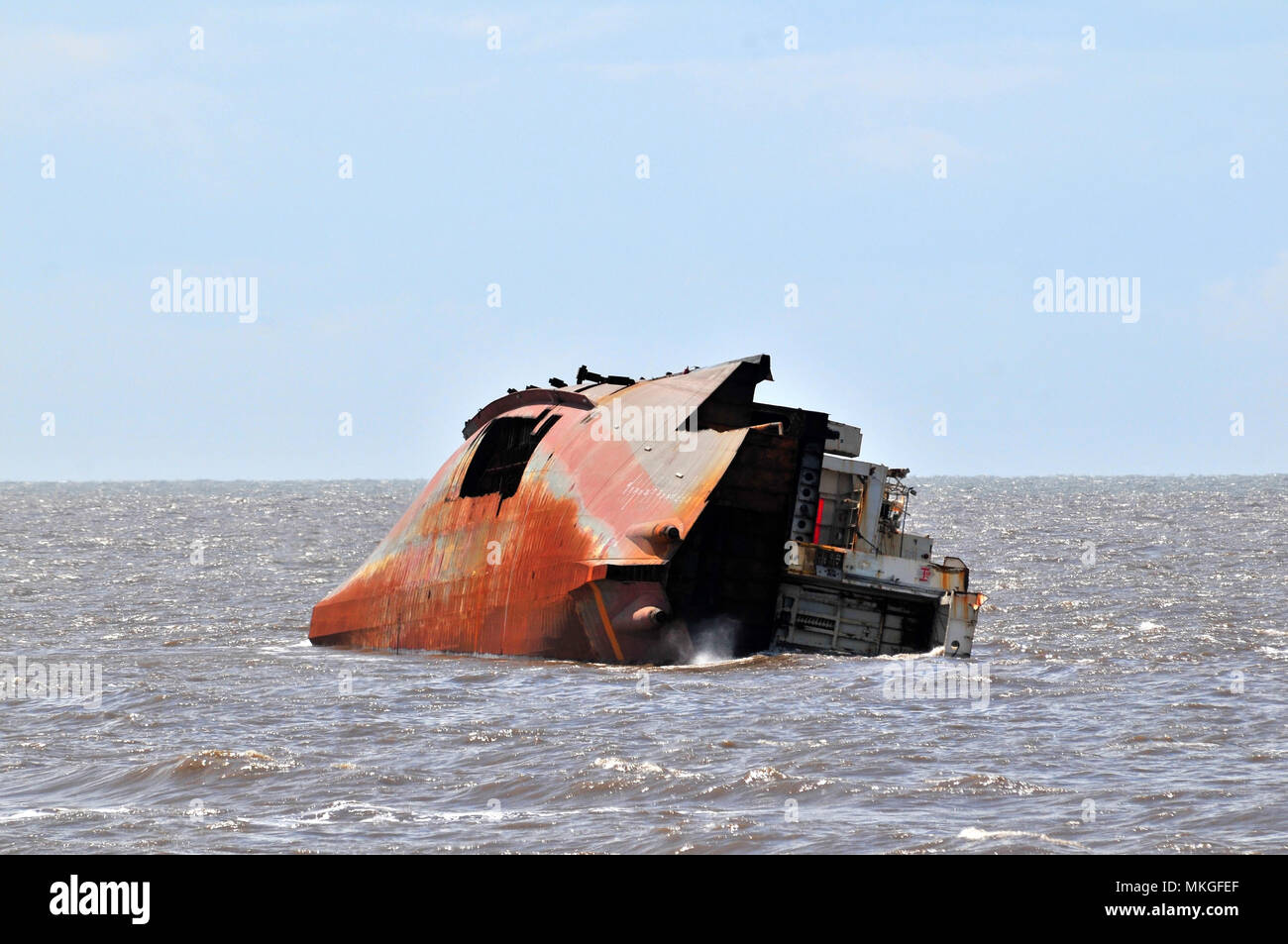 Blue sky, high tide vie of the stern of the Riverdance Ferry Wreck ...