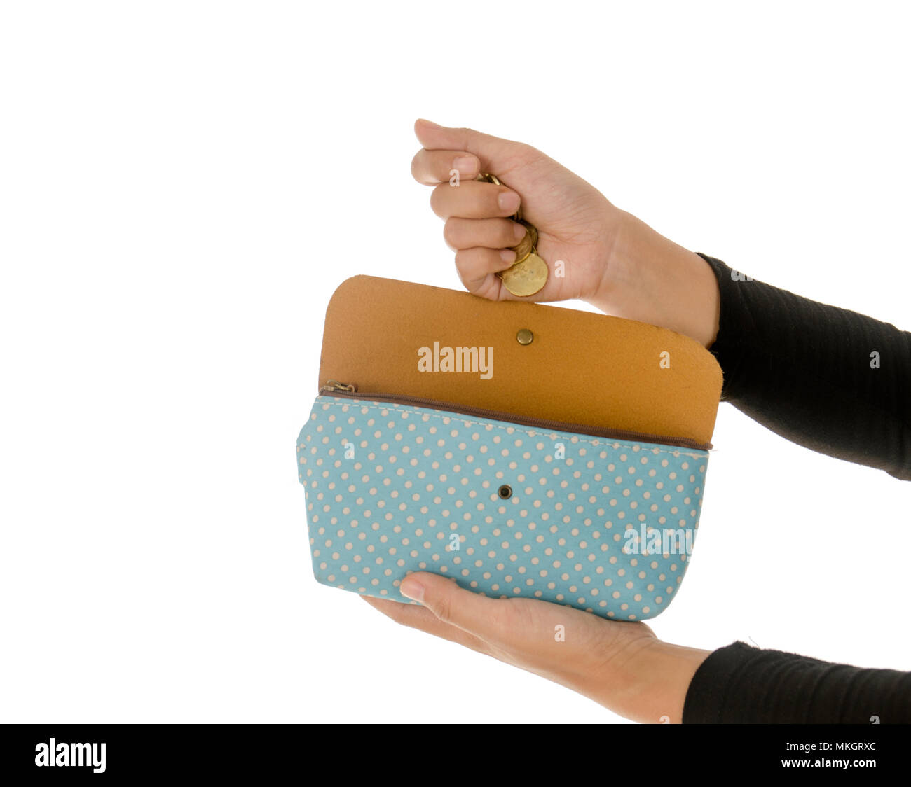Woman hand put money in purse isolated on white background Stock Photo ...