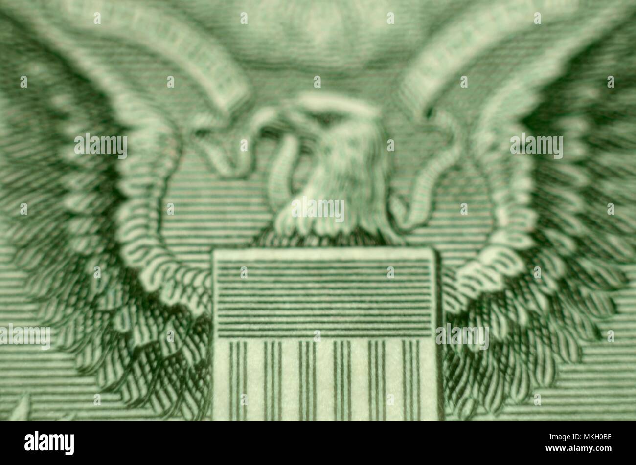Back of the US dollar bill, featuring the stripes from the American ...