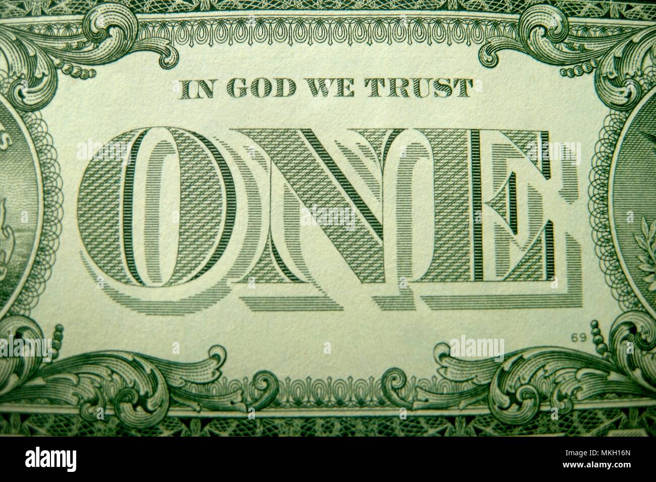 IN GOD WE TRUST and ONE centered in an ornate frame Stock Photo - Alamy