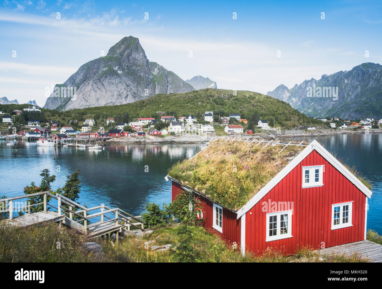 Scenic view from idyllic village with mountains at bright summer day in ...