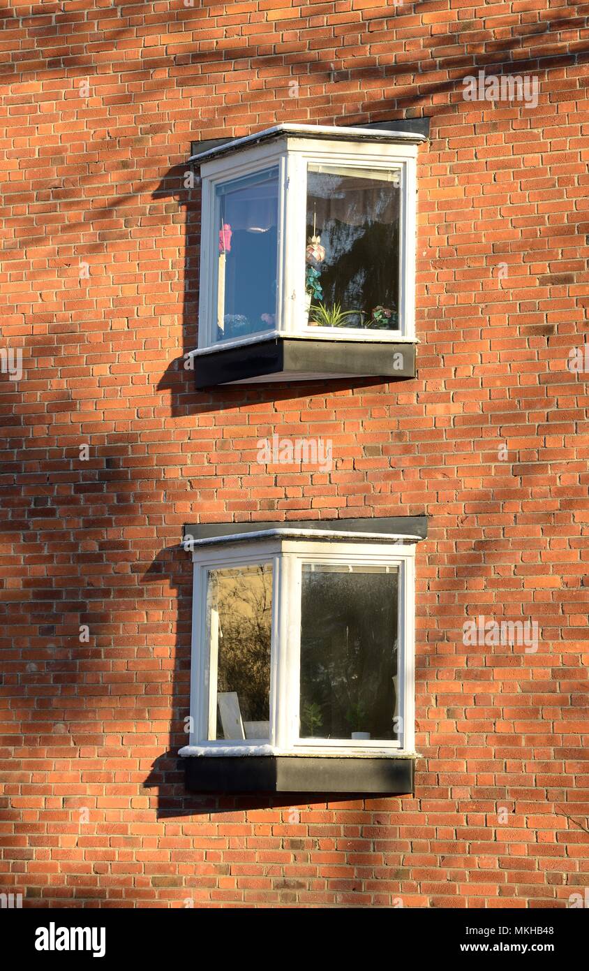 Brick wall with four windows in Stockholm, Sweden Stock Photo - Alamy