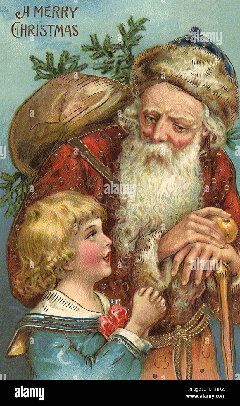 Young Boy talking to Santa Stock Photo - Alamy