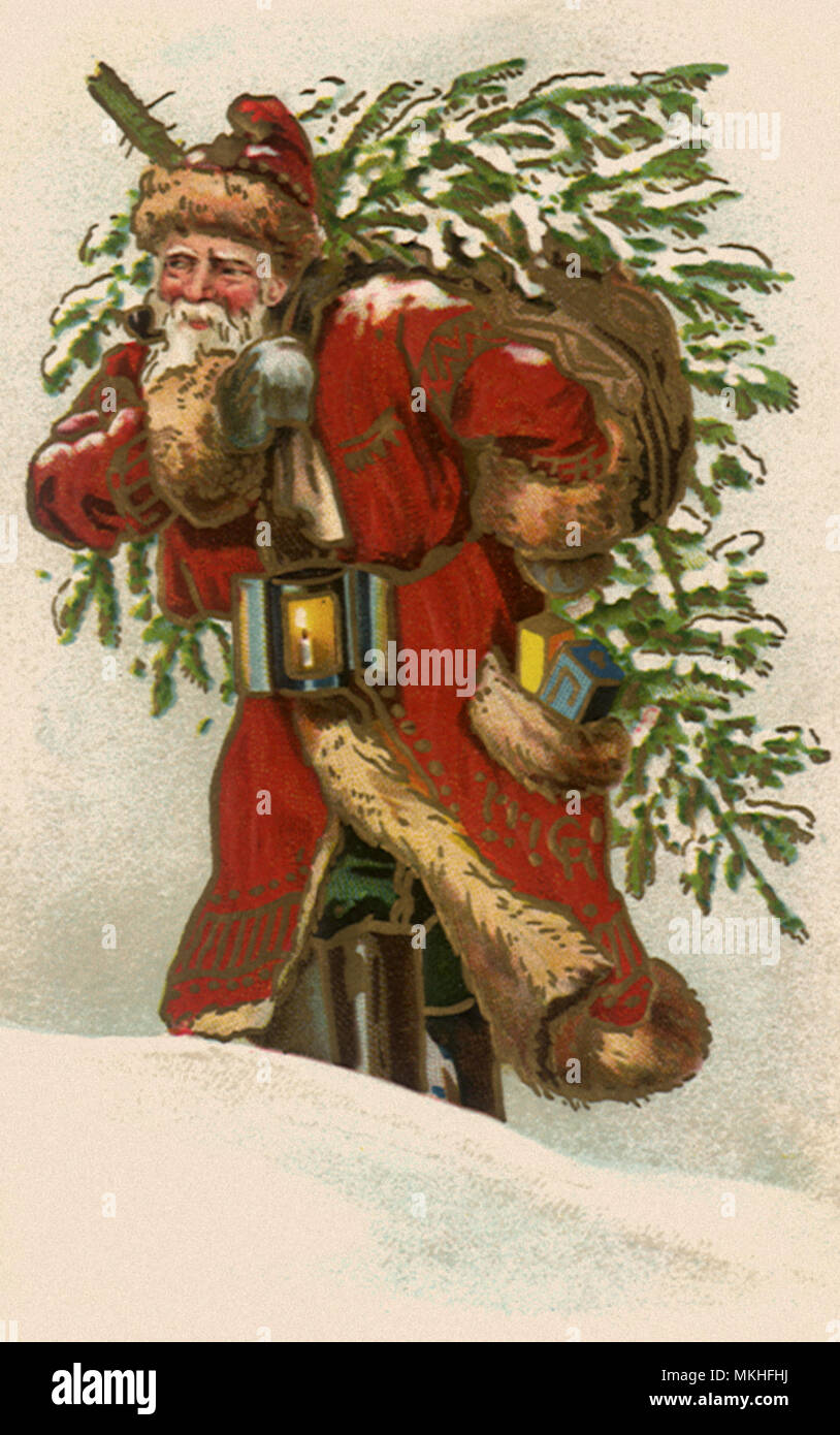Santa Carrying Tree and Toys on Back Stock Photo - Alamy