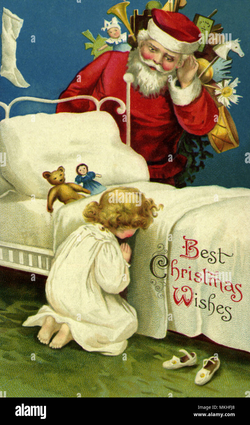 Santa Listens to Girl Pray Stock Photo - Alamy