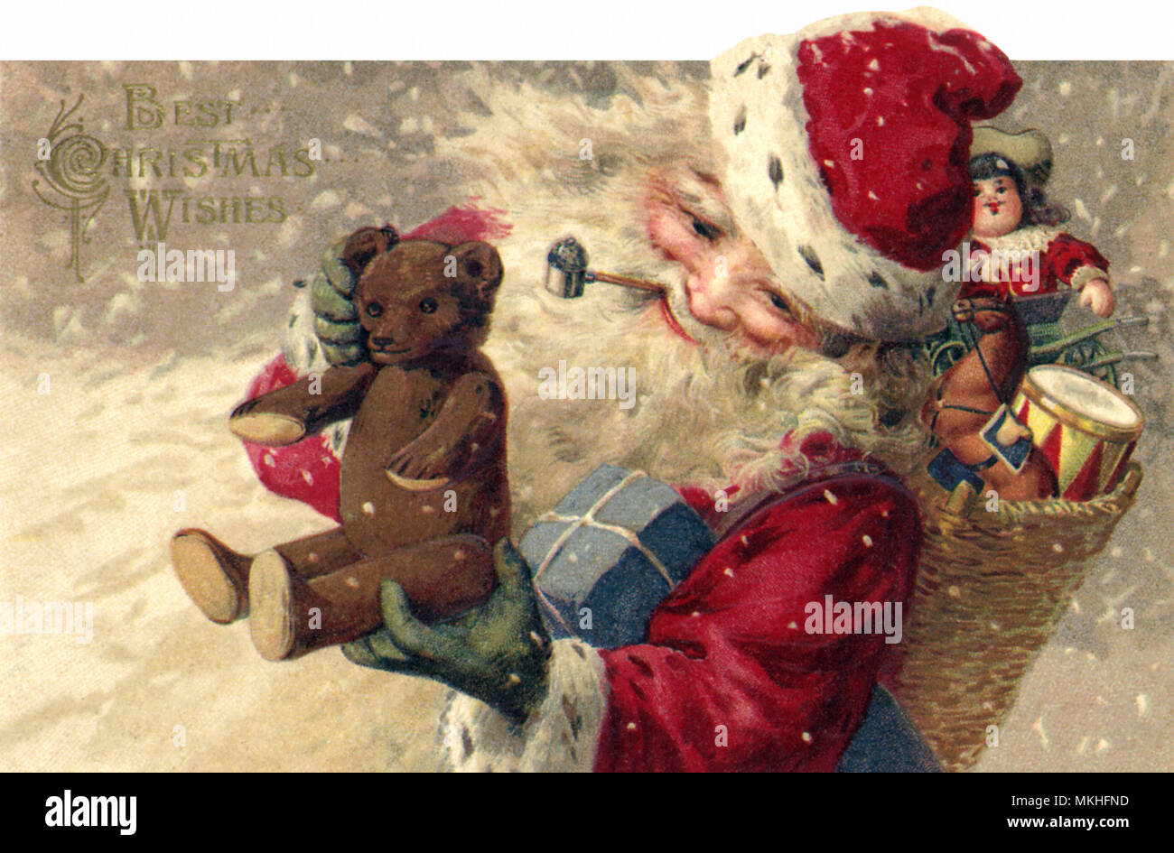 Santa Holding Toys in a Blizzard Stock Photo - Alamy