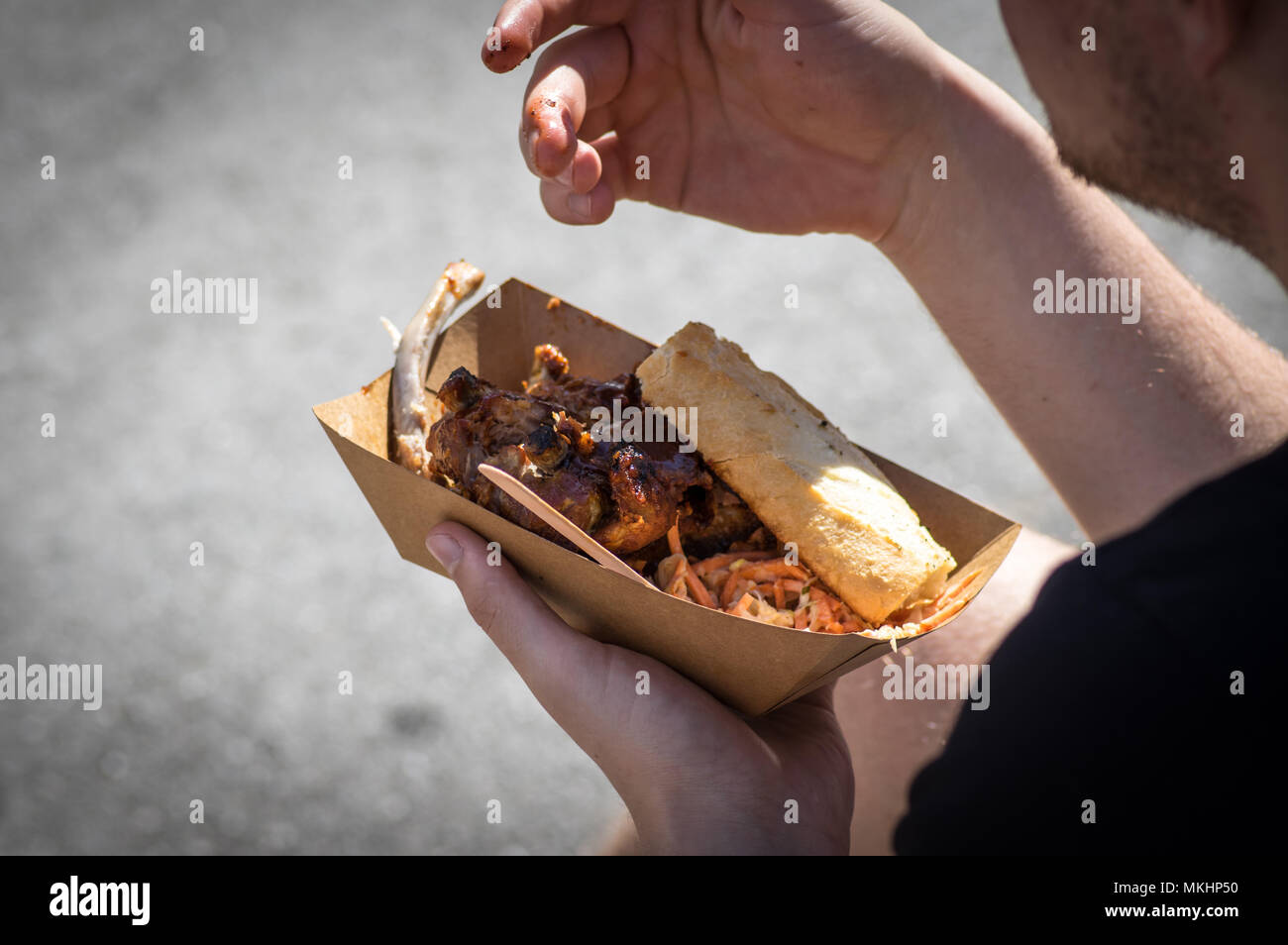 Man eating pork ribs hi-res stock photography and images - Alamy