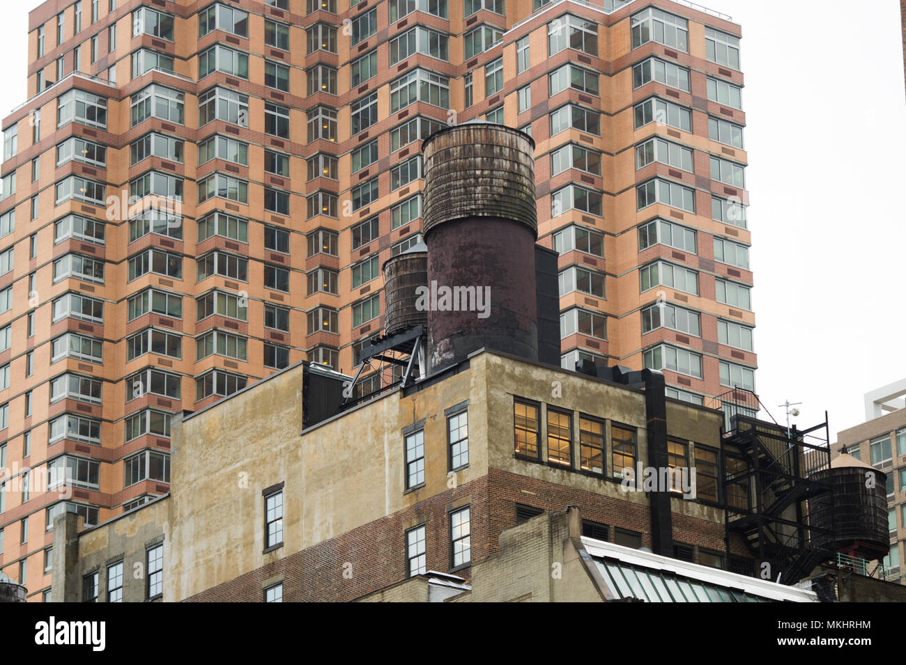 Close-up view of New York skyscrapers with water tanks on the roof of ...