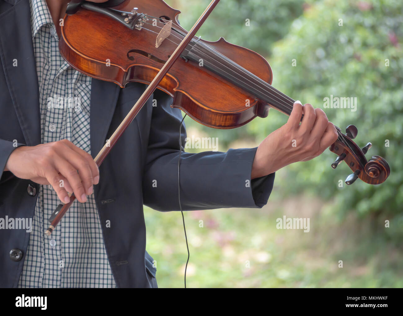 Hands of Musician Playing A Song with Violin in The Park Background ...