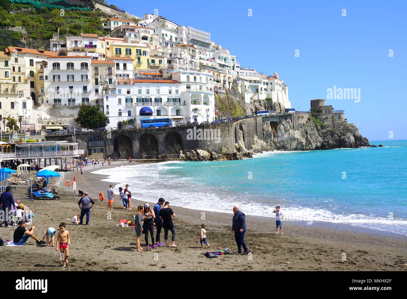 Beachfront with colorful houses built on mountain slope in Positano ...