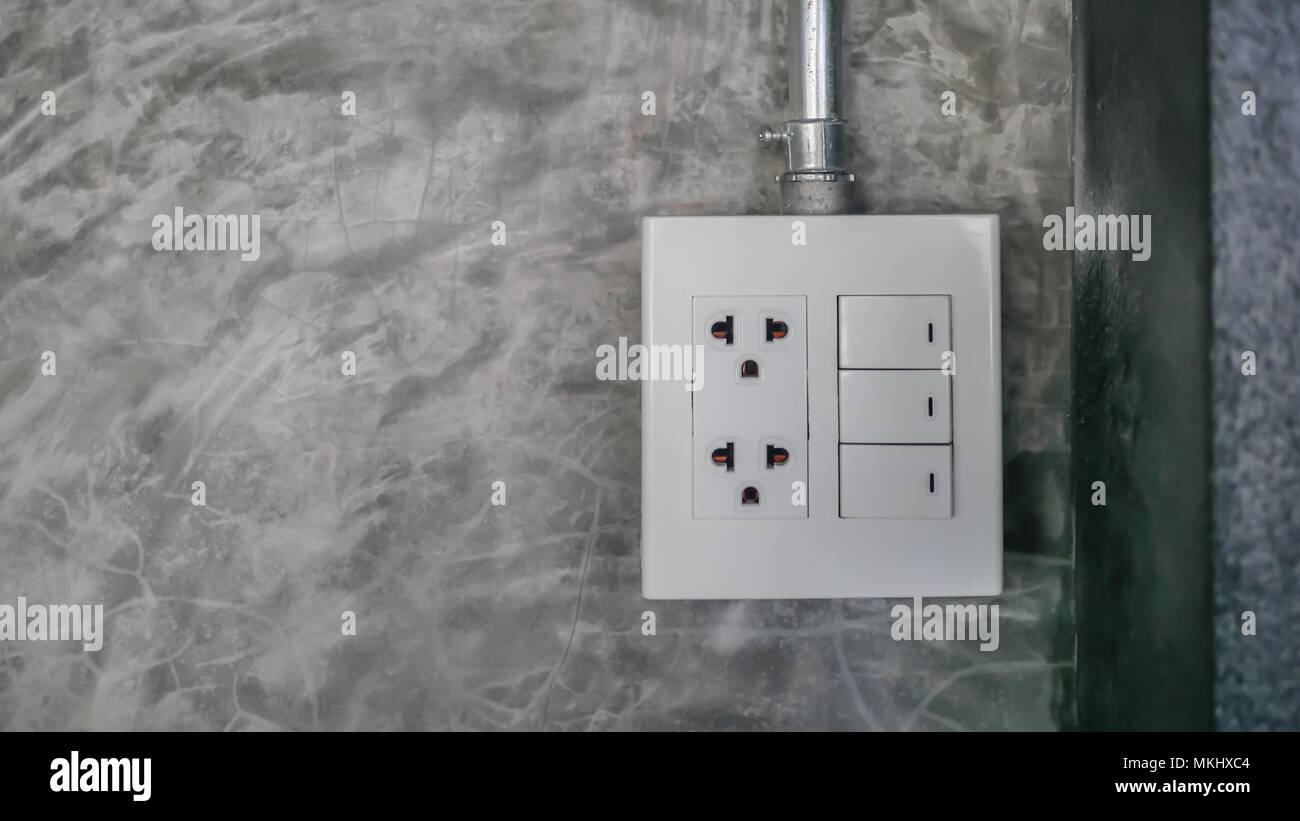 Light switch on wall grey hi-res stock photography and images - Alamy