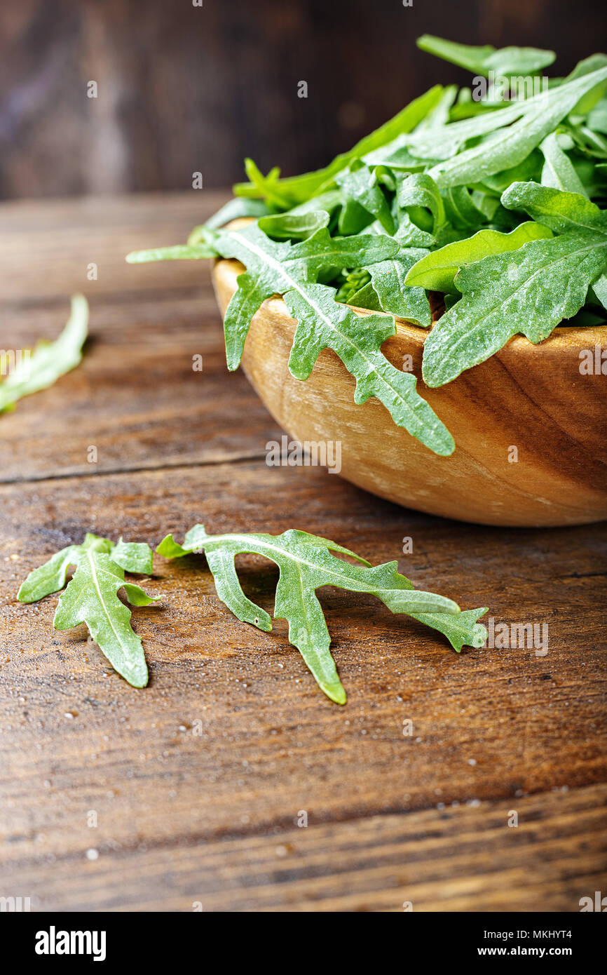 Fresh rukola in a plate, organic greens, rich in microelements and ...