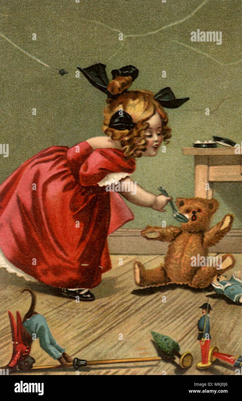 Children feeding teddy bear hi-res stock photography and images - Alamy