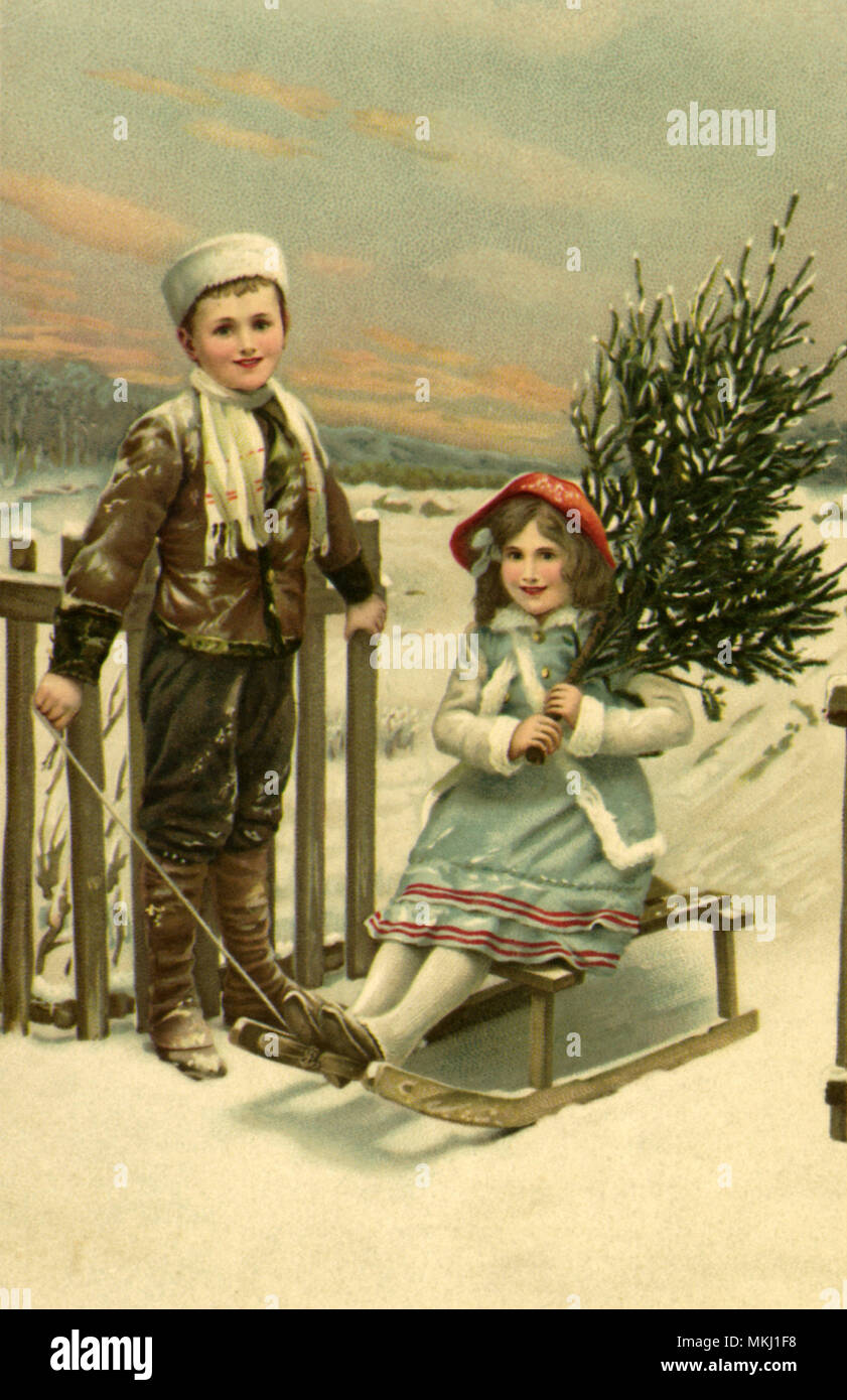 Children, Sled and Tree Stock Photo - Alamy