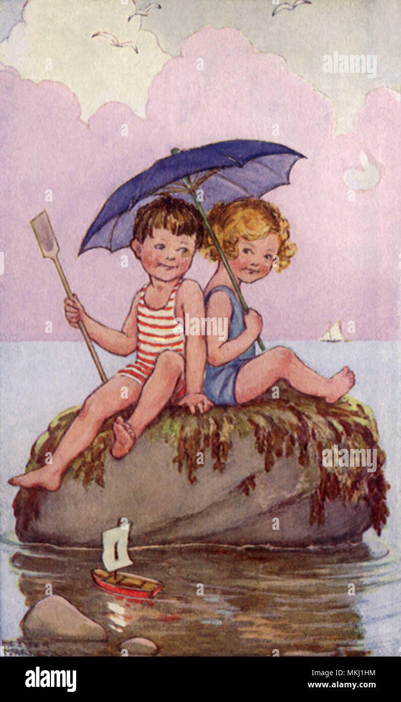 Boy, Girl on Rock Stock Photo - Alamy