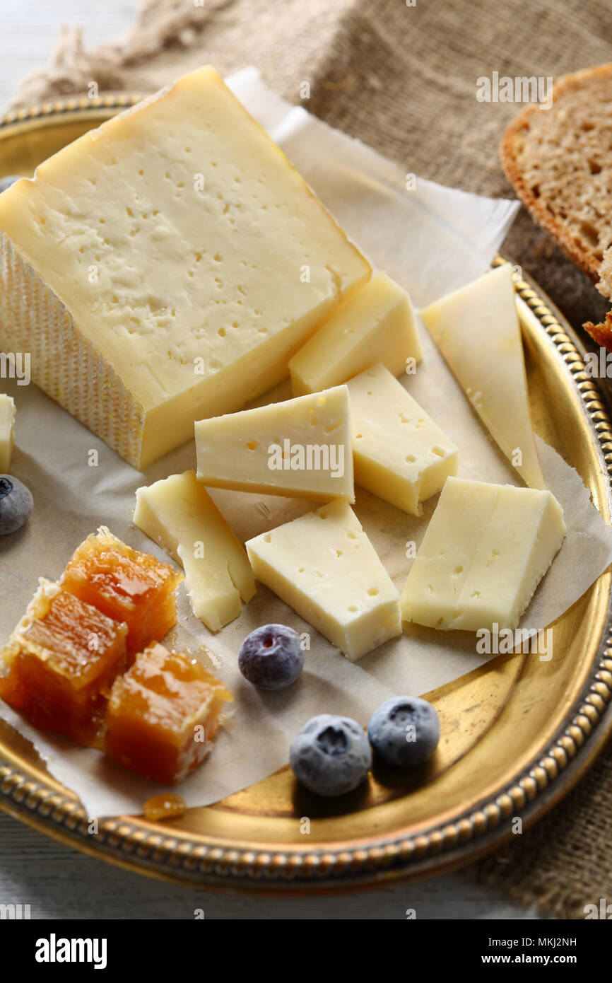 breakfast with cheese and honey, food close-up Stock Photo - Alamy