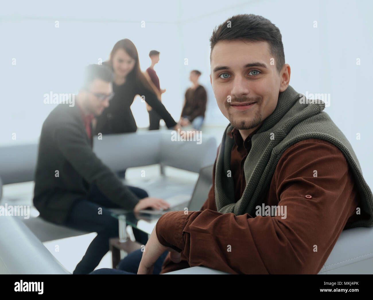 modern man in the background of the office Stock Photo - Alamy