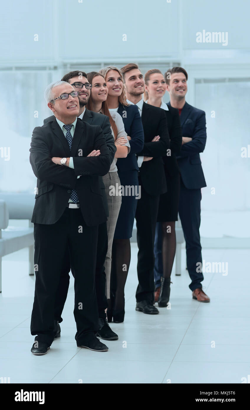 professional team confidently look forward, standing in the middle of ...