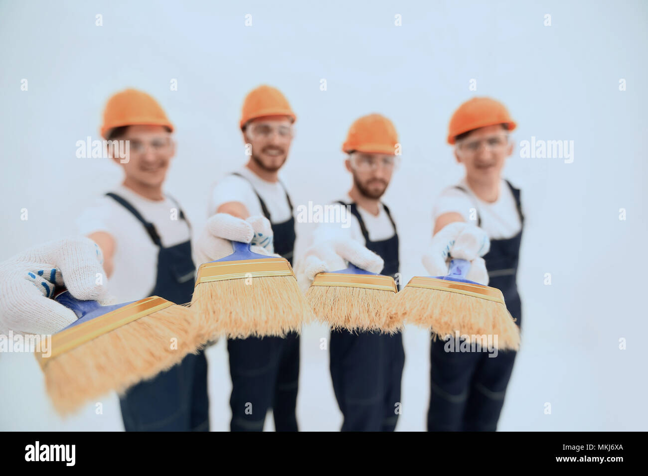 group of builders with different tools Stock Photo - Alamy
