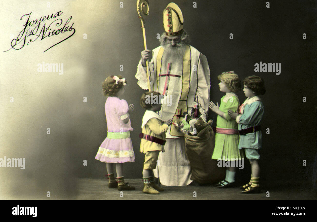 St. Nick and Four Kids Stock Photo - Alamy