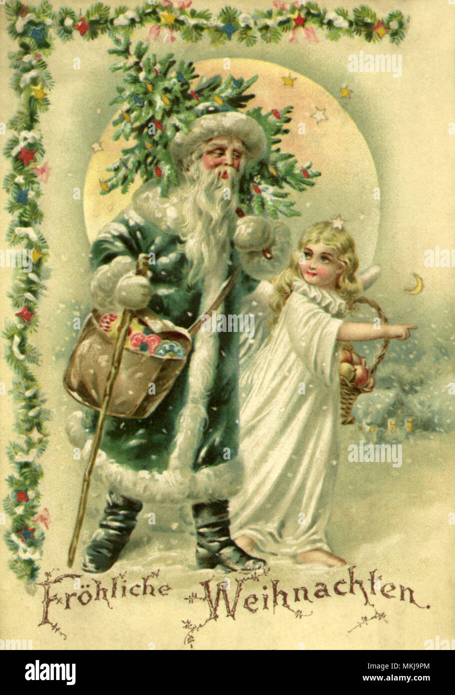 Angel and Santa with Tree Stock Photo - Alamy