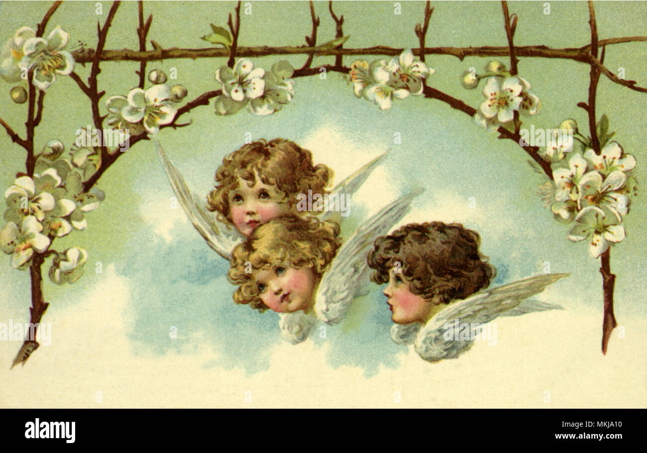 Three angel heads hi-res stock photography and images - Alamy
