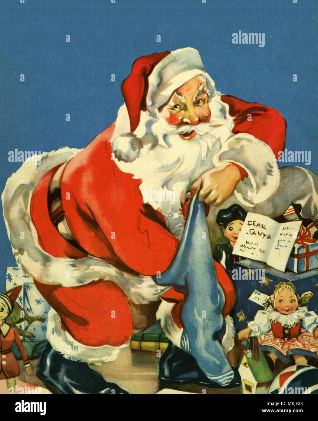 Santa Leaving Toys Stock Photo - Alamy