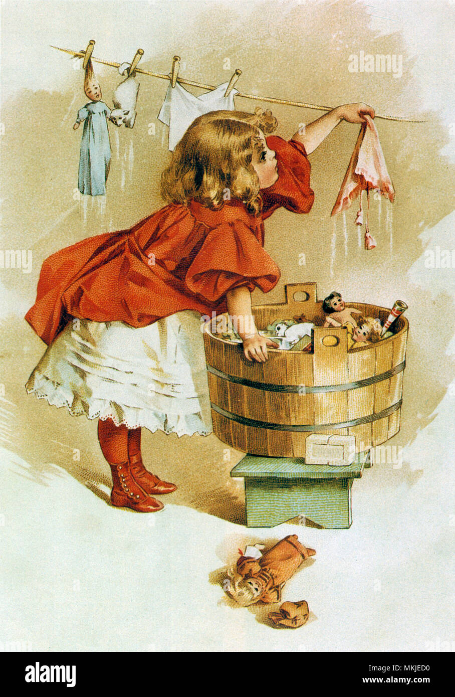 Girl Hangs Duds on Line Stock Photo - Alamy