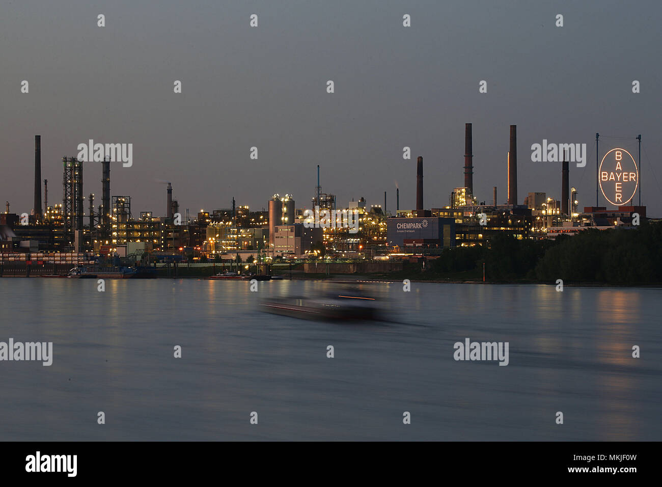 07 May 2018, Germany, Leverkusen: The Bayer cross glowing on the ...