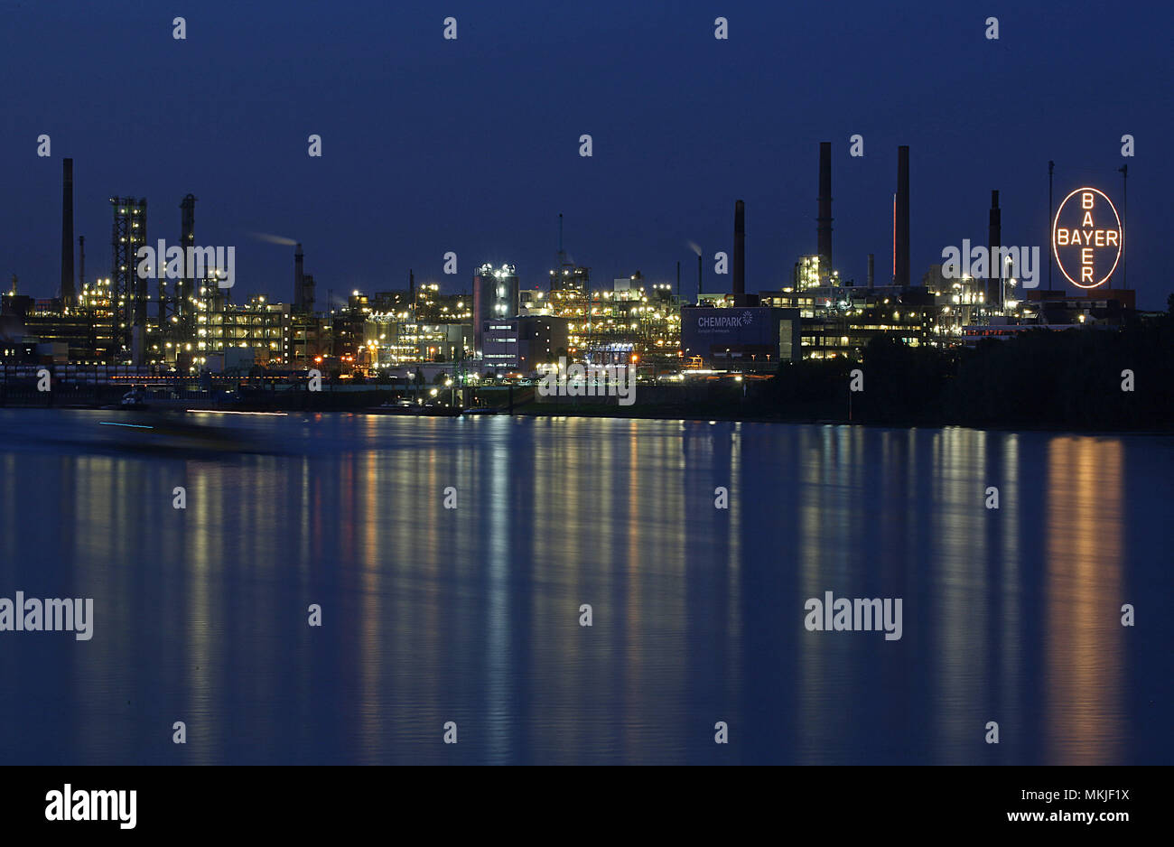07 May 2018, Germany, Leverkusen: The Bayer cross glowing on the ...