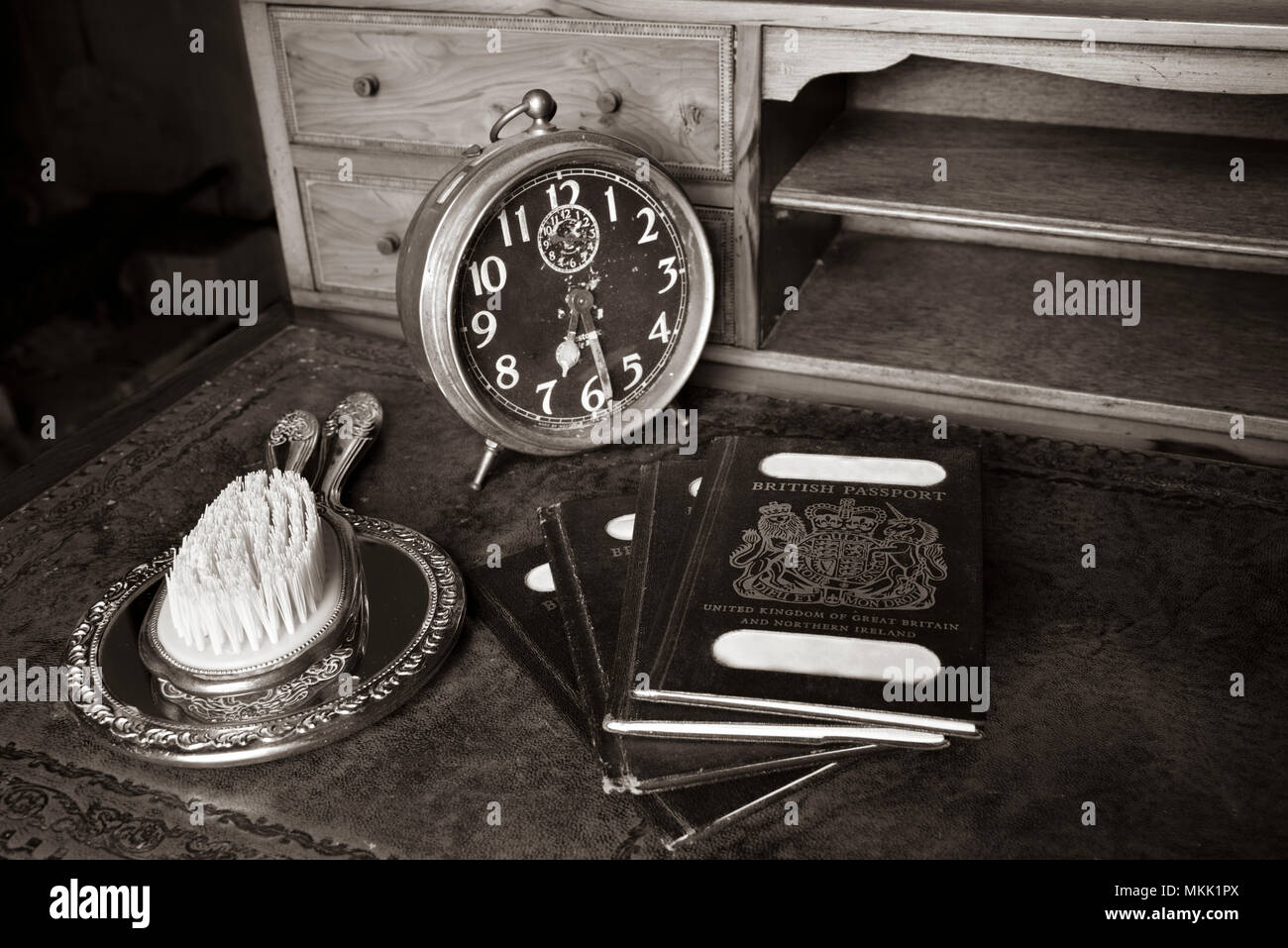 antique timber desk with passports and vintage leica II from 1932 ...