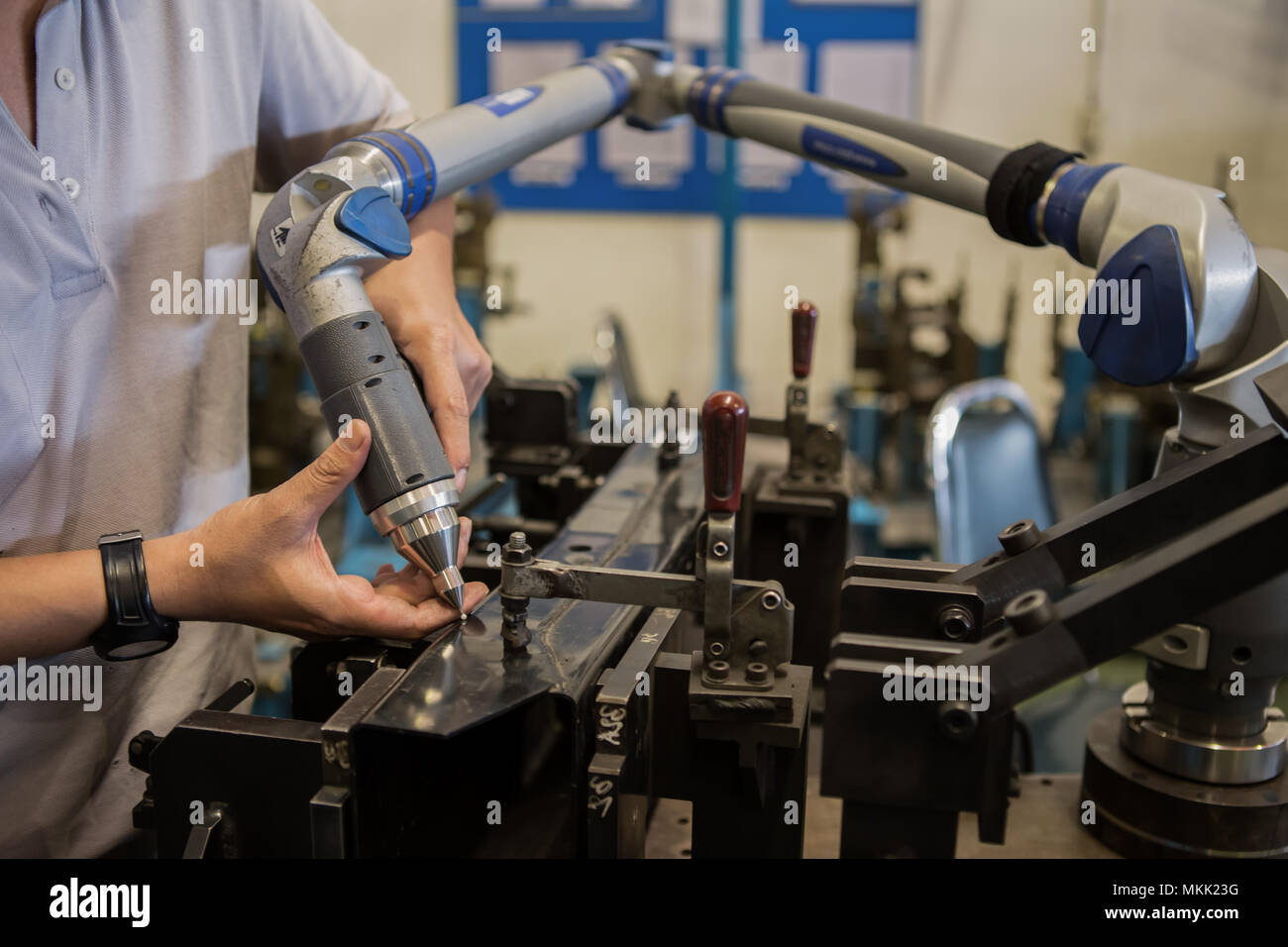 Inspection operator is check gap and dimension part in car factory ...