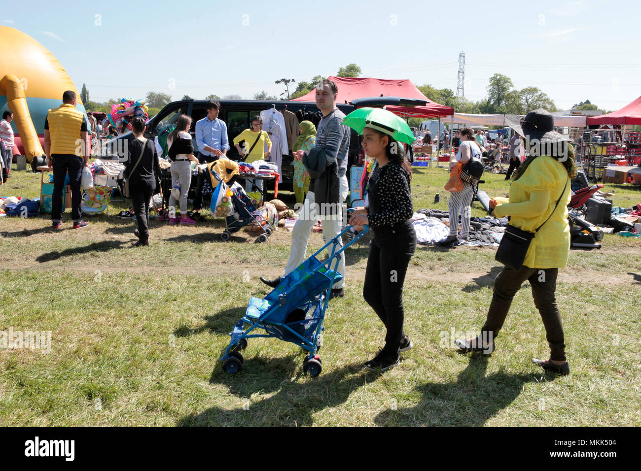 People looking at stalls at a Car Boot sale, in Denham, Hertfordshire ...