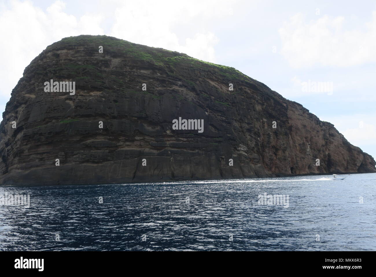 Mighty rock in Indian ocean near Mauritius island Stock Photo - Alamy