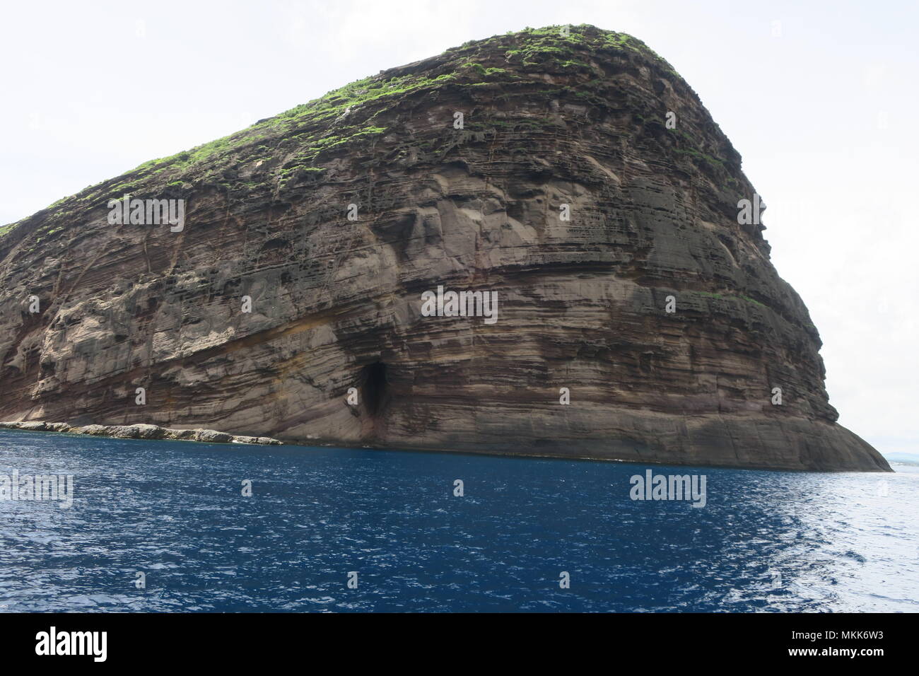 Mighty rock in Indian ocean near Mauritius island Stock Photo - Alamy