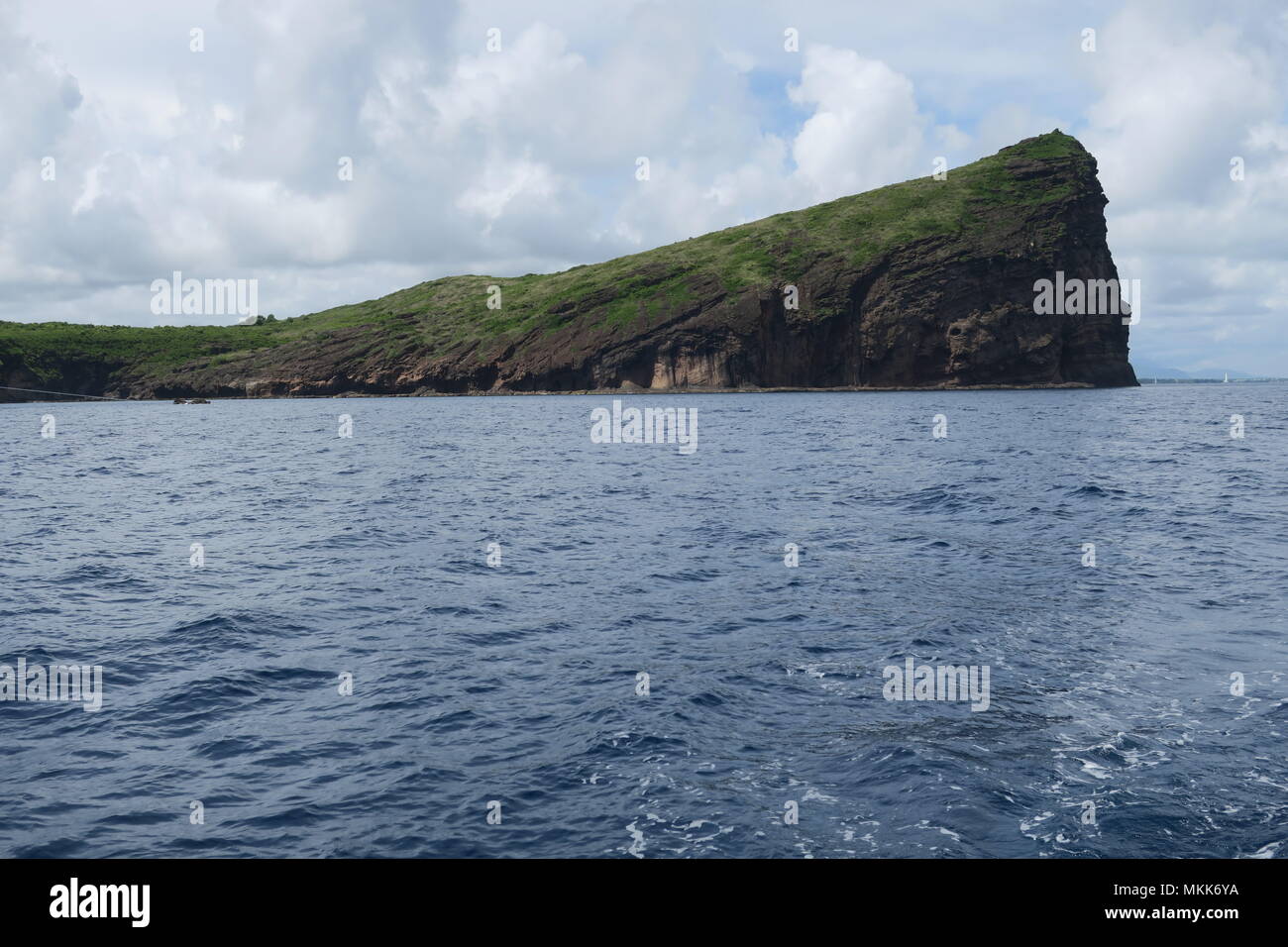 Mighty rock in Indian ocean near Mauritius island Stock Photo - Alamy
