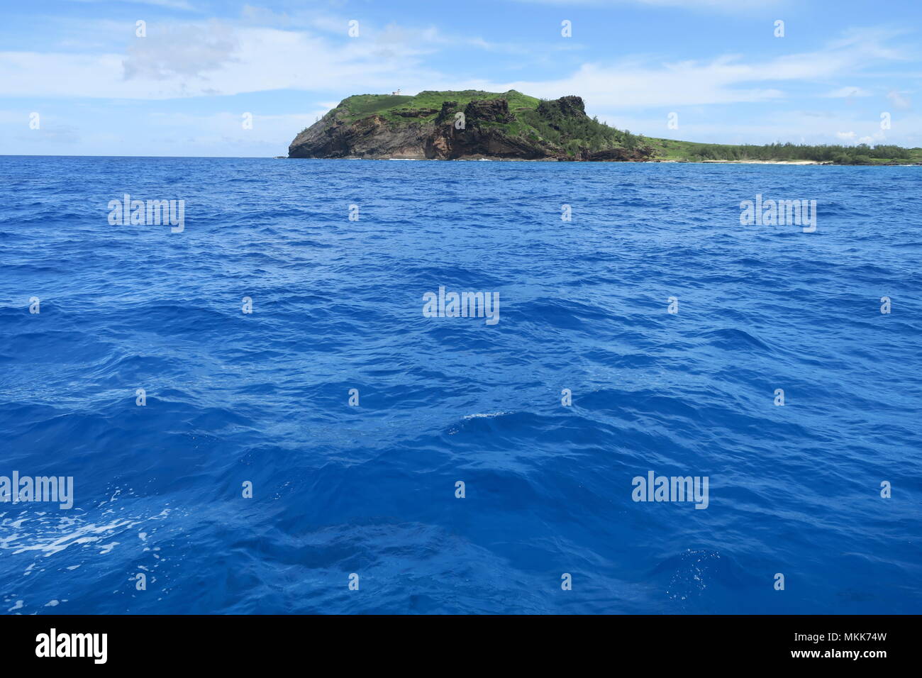 Mighty rock in Indian ocean near Mauritius island Stock Photo - Alamy