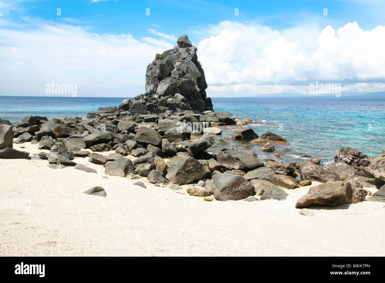 rock formation on apo island beach in the philippines Stock Photo - Alamy