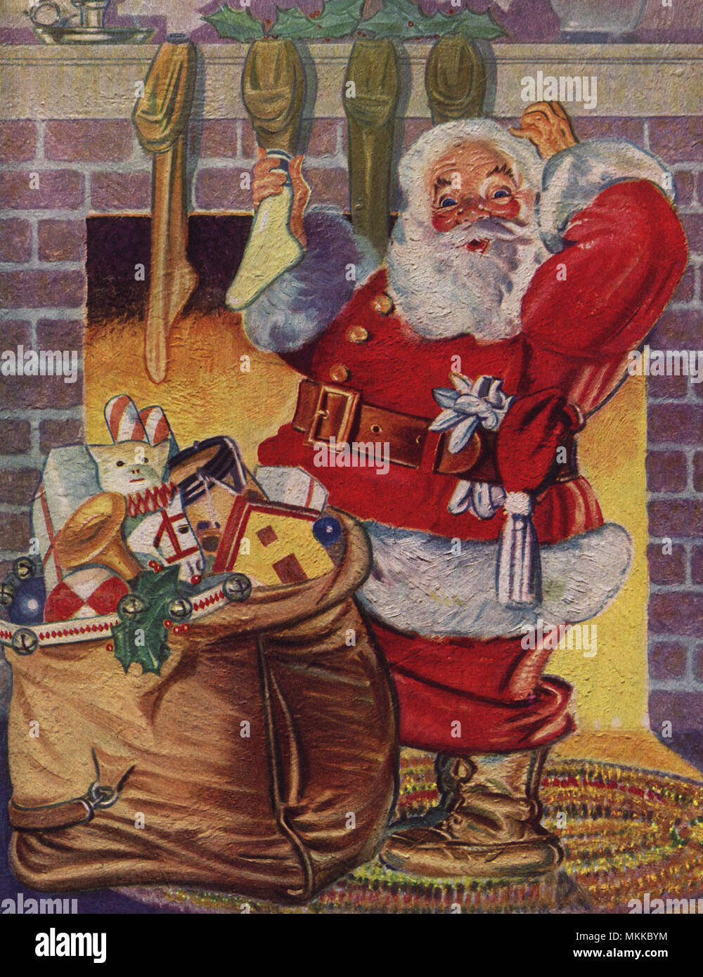 Santa Holding Sock Stock Photo - Alamy