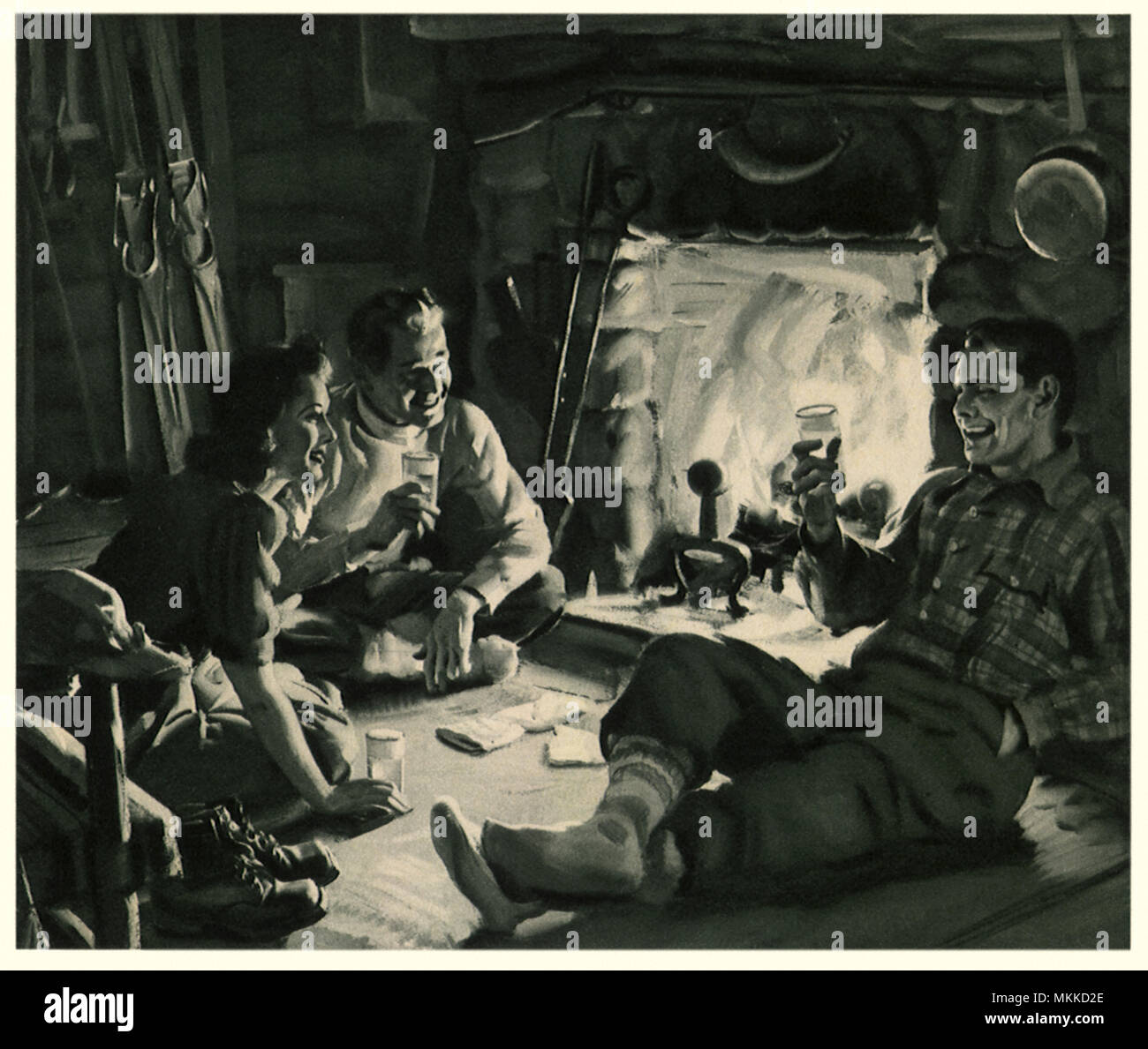 Having Drinks by Fire Stock Photo - Alamy