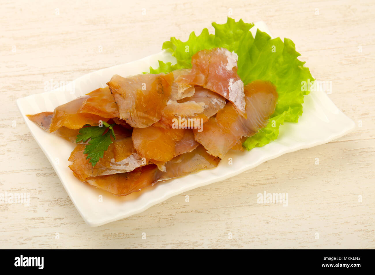 Smoked catfish fillet carpaccio Stock Photo - Alamy