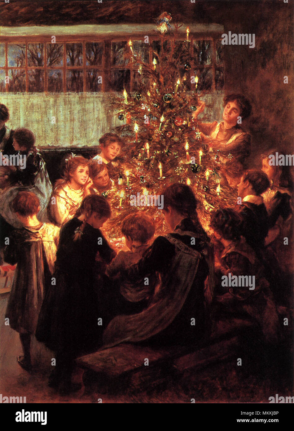 Group around christmas tree hi-res stock photography and images - Alamy
