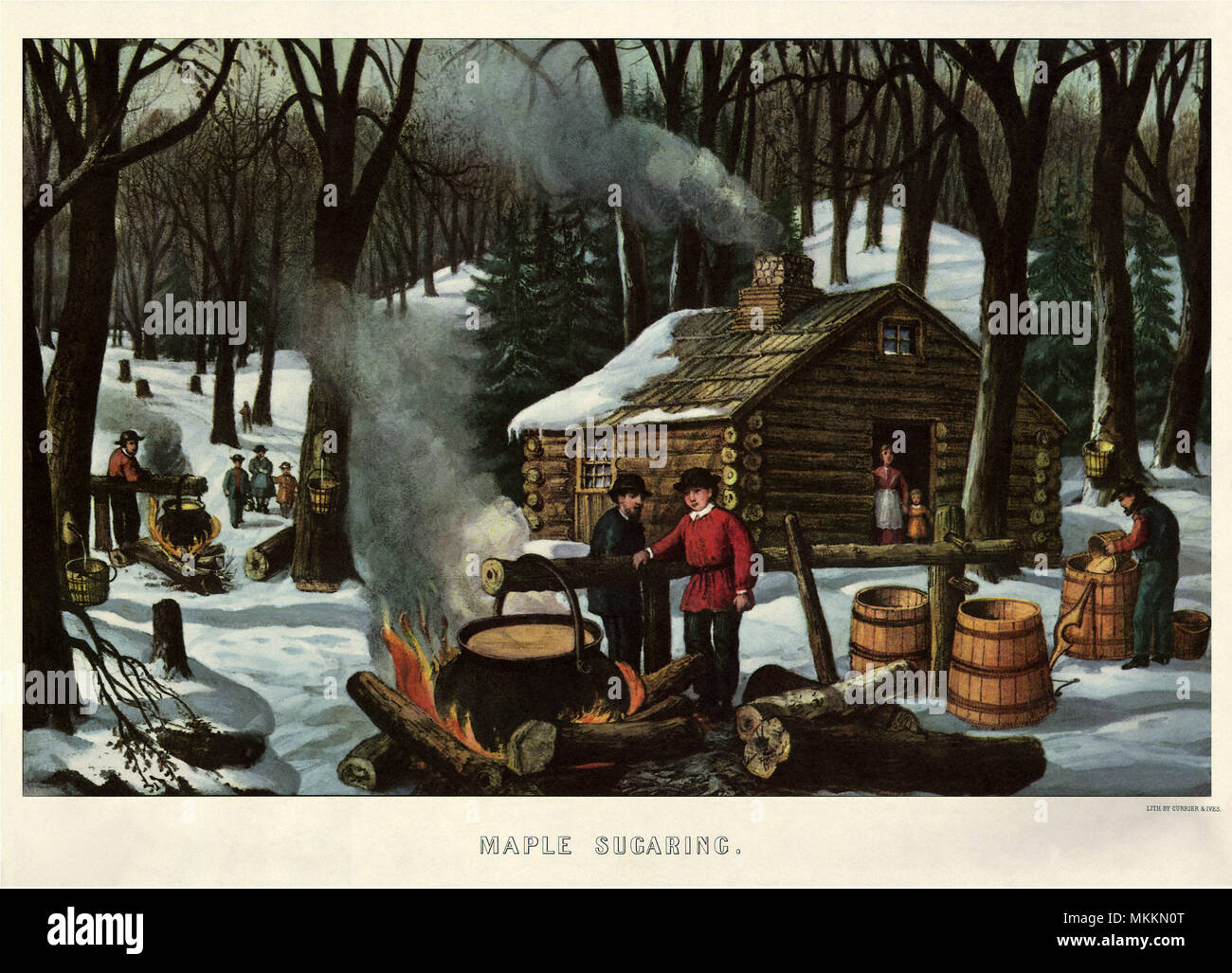 Men Making Maple Syrup in Woods Stock Photo - Alamy