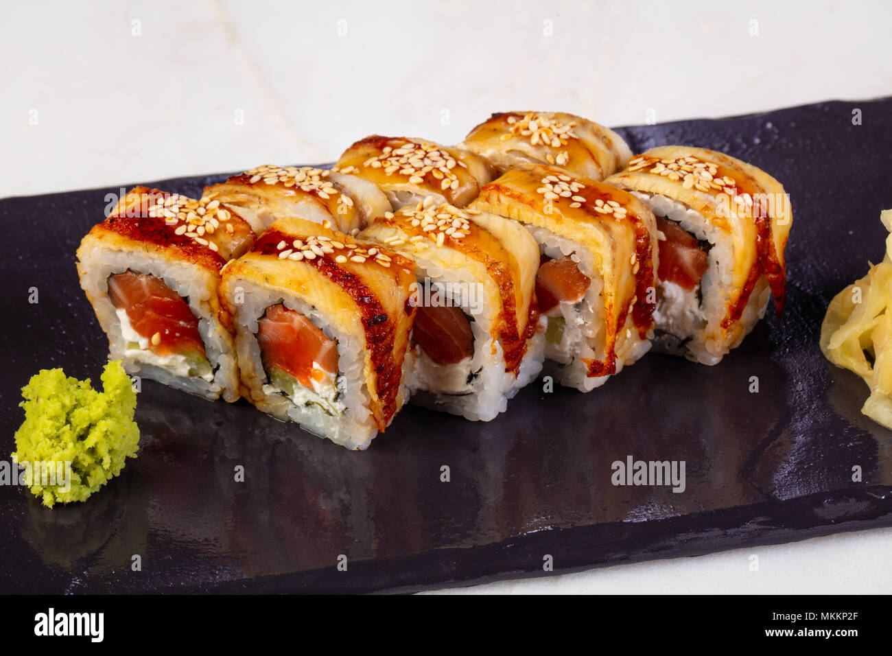 Canada roll with eel and wasabi Stock Photo - Alamy