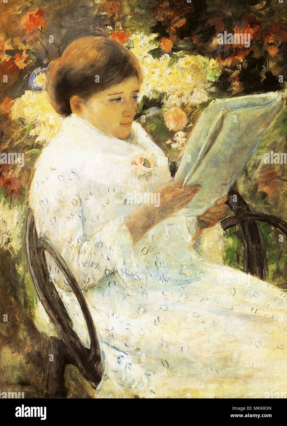 Seated Woman Reading Stock Photo - Alamy