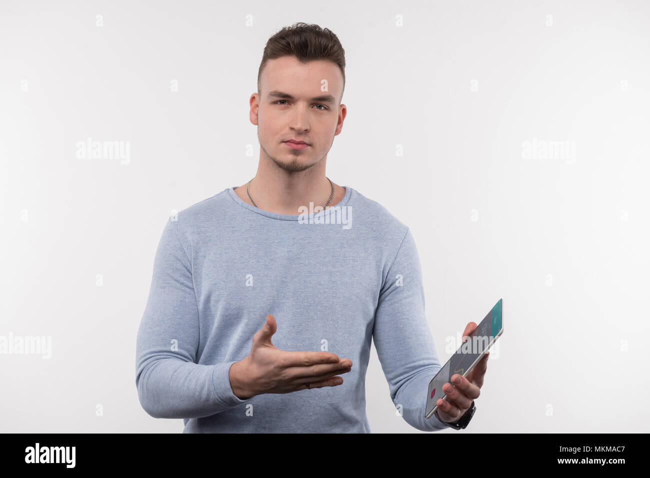 Nice young man looking at you Stock Photo - Alamy
