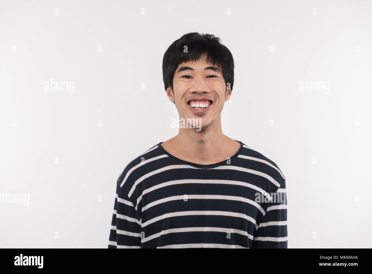 Cheerful millennial asian man hi-res stock photography and images - Alamy