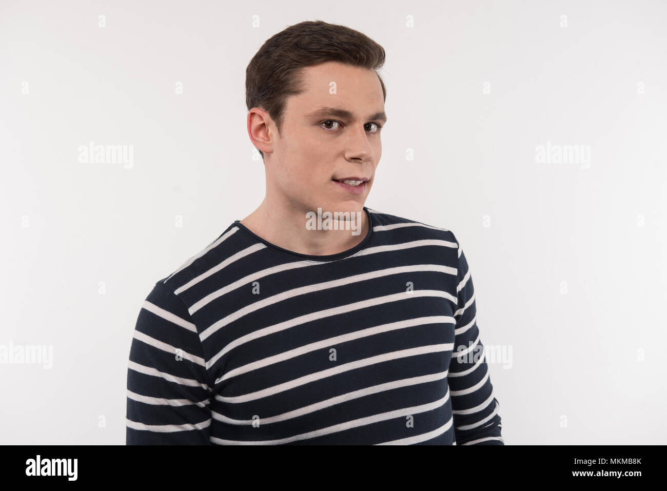 Nice serious man looking at you Stock Photo - Alamy