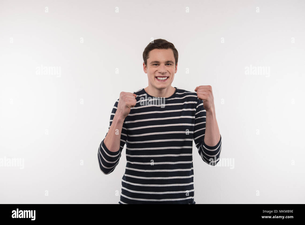 Happy elated hi-res stock photography and images - Alamy